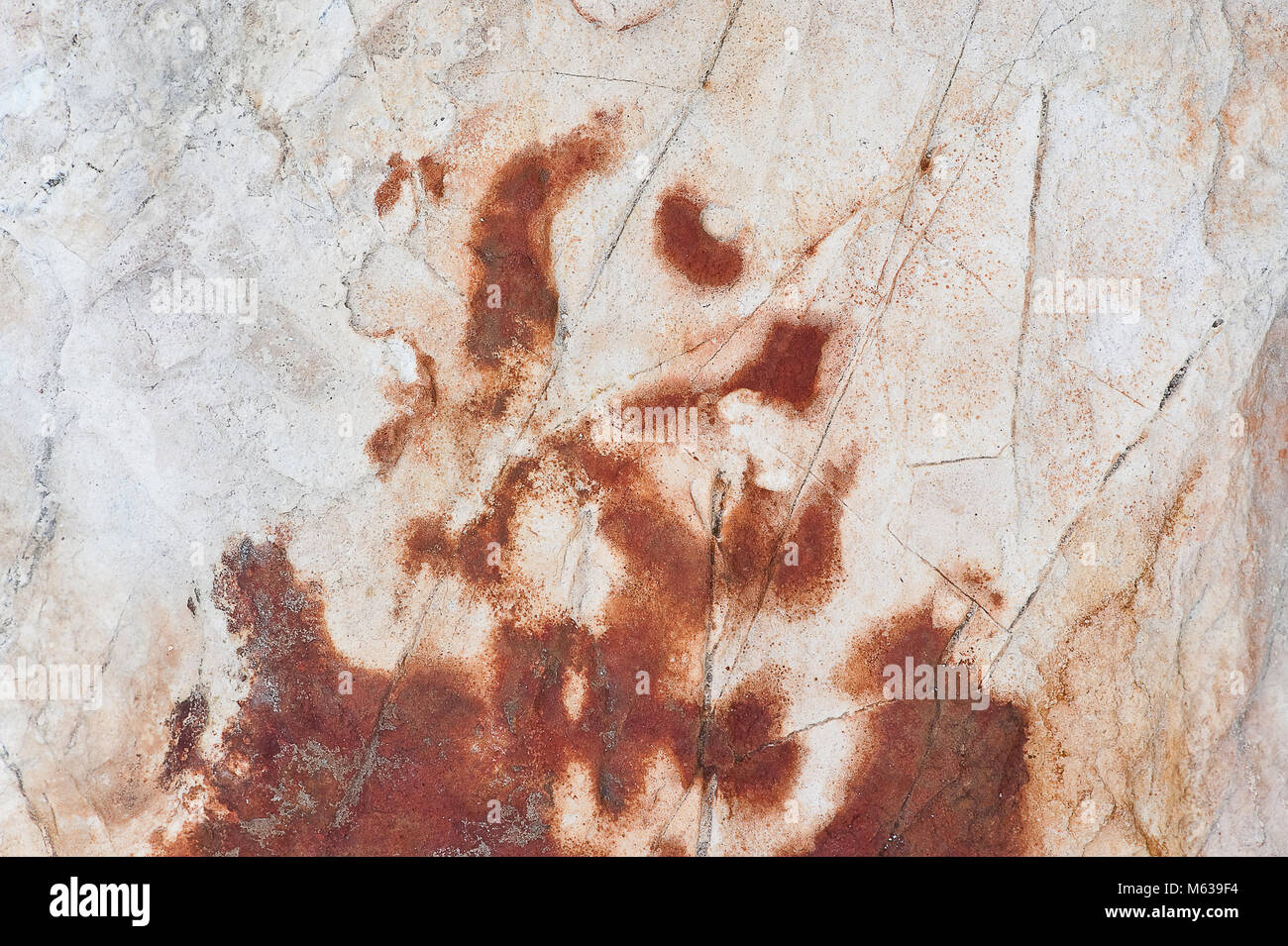 red pattern on a white abstract looking rock Stock Photo - Alamy