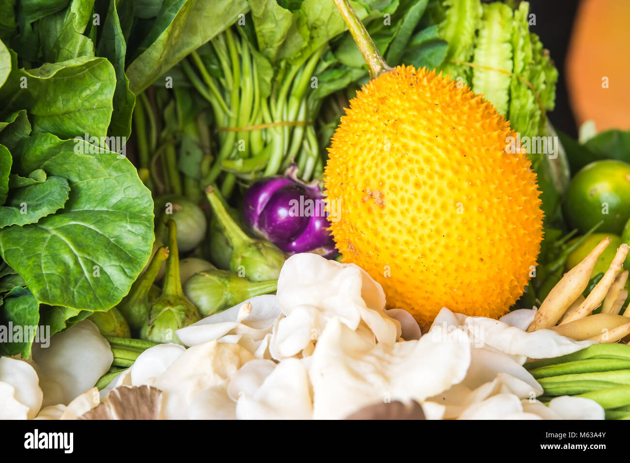 Various Thai vegetables and spices in basket, ready for cooking ...