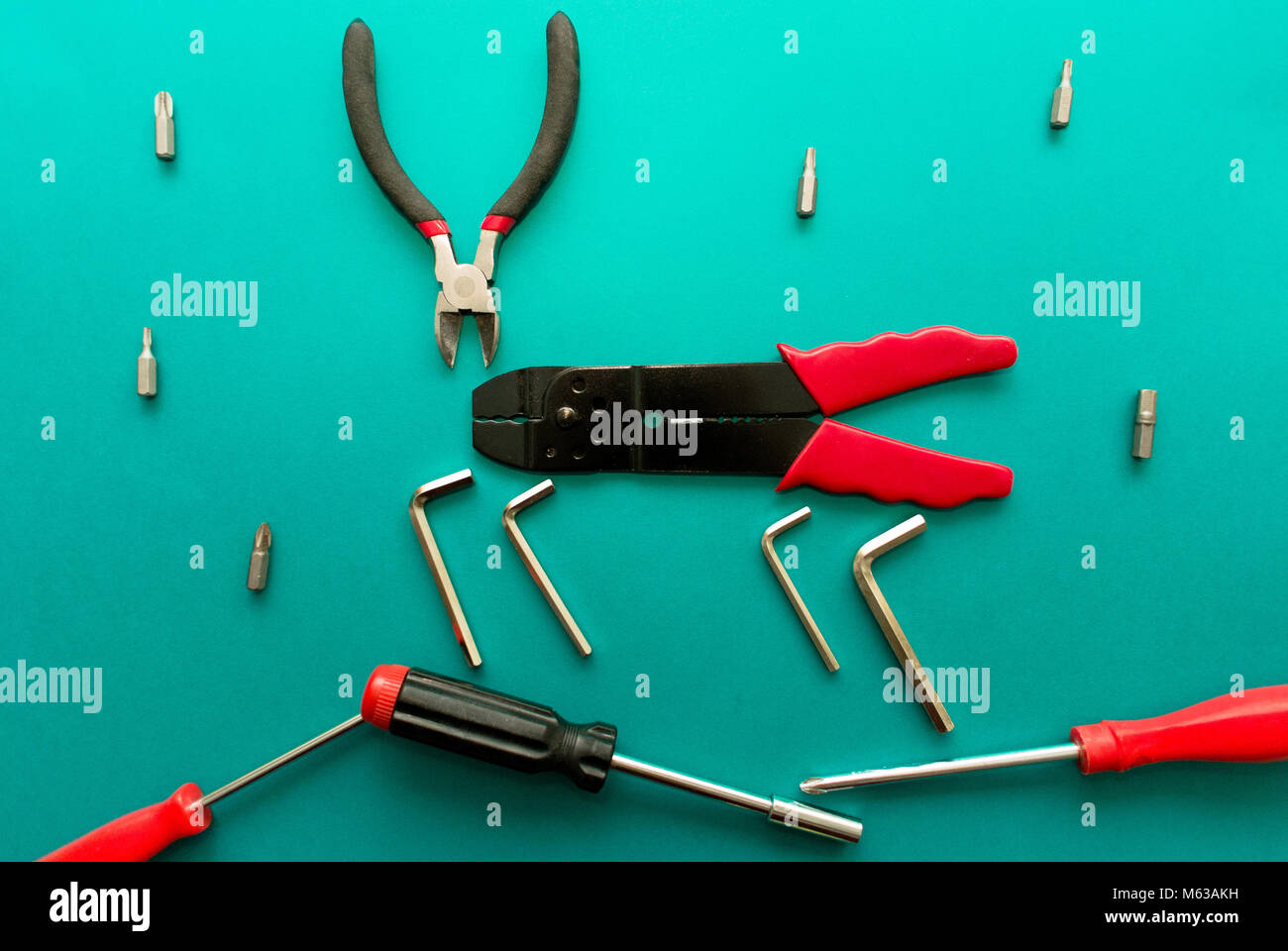 Set of tools on green background. It looks like a deer. Working ...