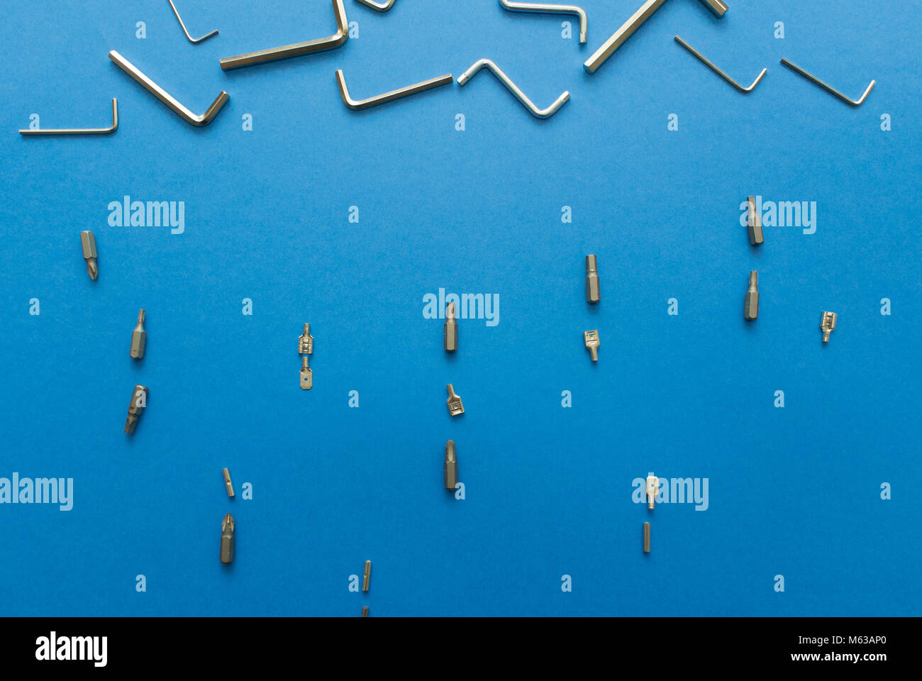 Conceptual set of tools on blue background. It looks like raining ...