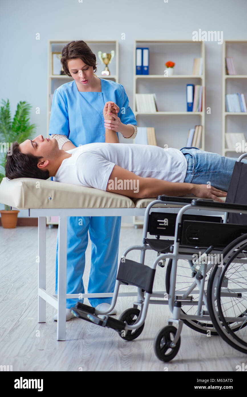 Patient undergoing rehabilitation recovery programme with doctor Stock ...