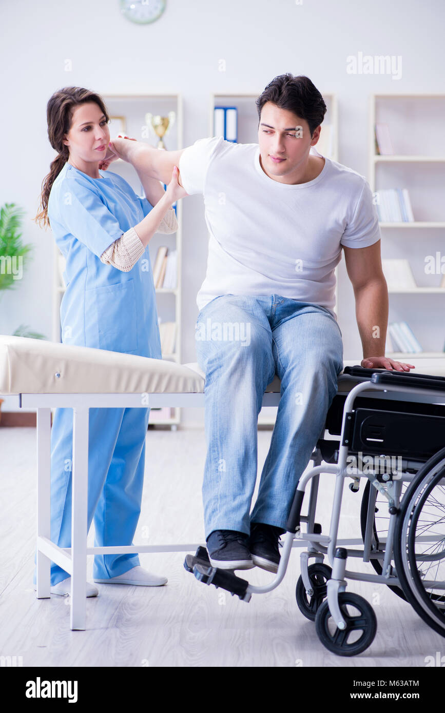 Patient undergoing rehabilitation recovery programme with doctor Stock ...