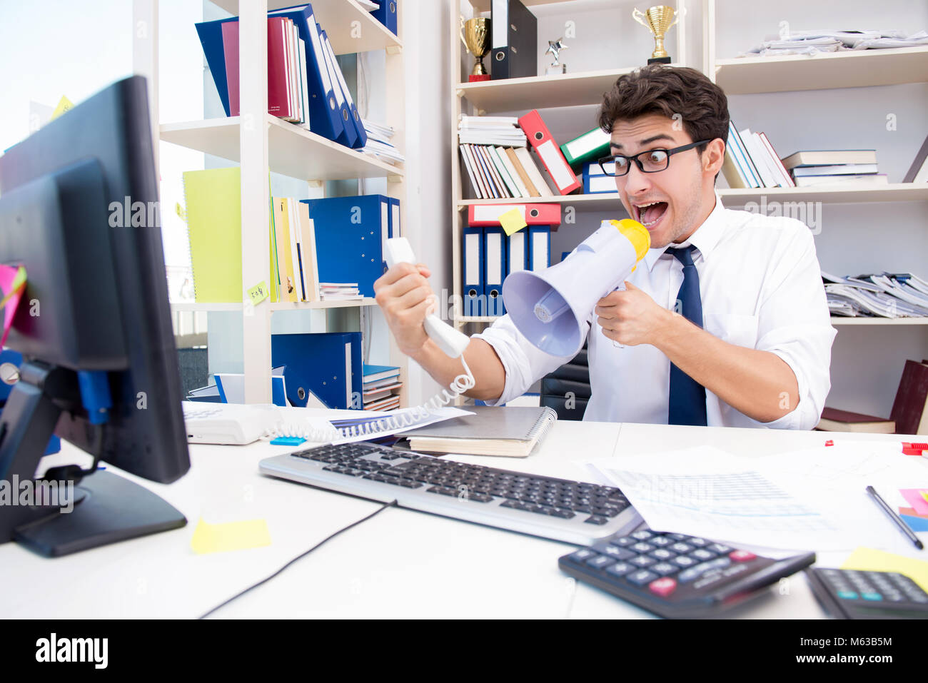 Busy frustrated businessman angry in the office Stock Photo - Alamy