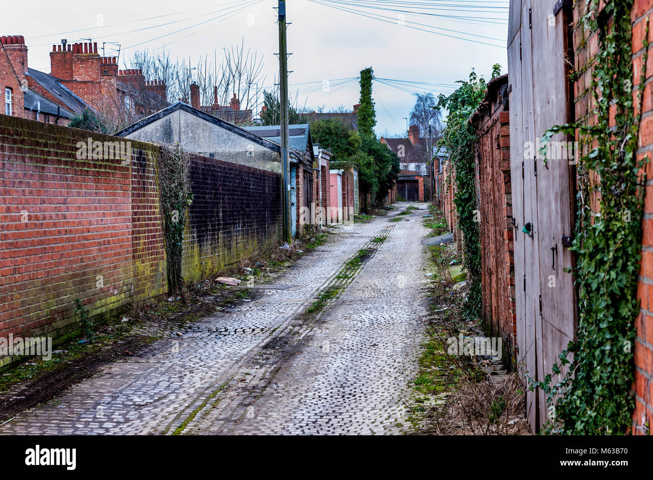 Alleyway and garages between houses, Northampton, U.K Stock Photo - Alamy