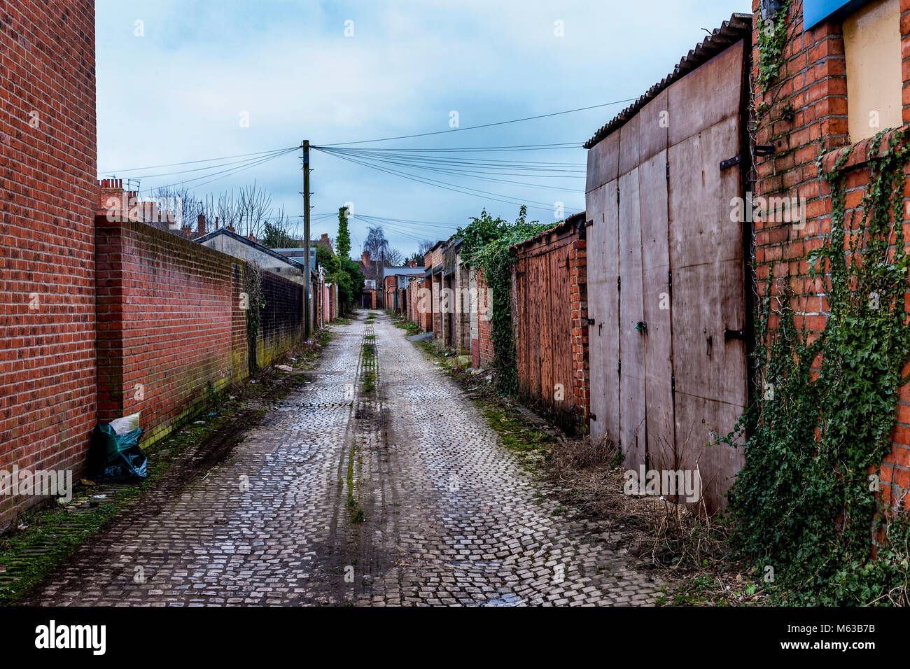 Alleyway and garages between houses, Northampton, U.K Stock Photo - Alamy