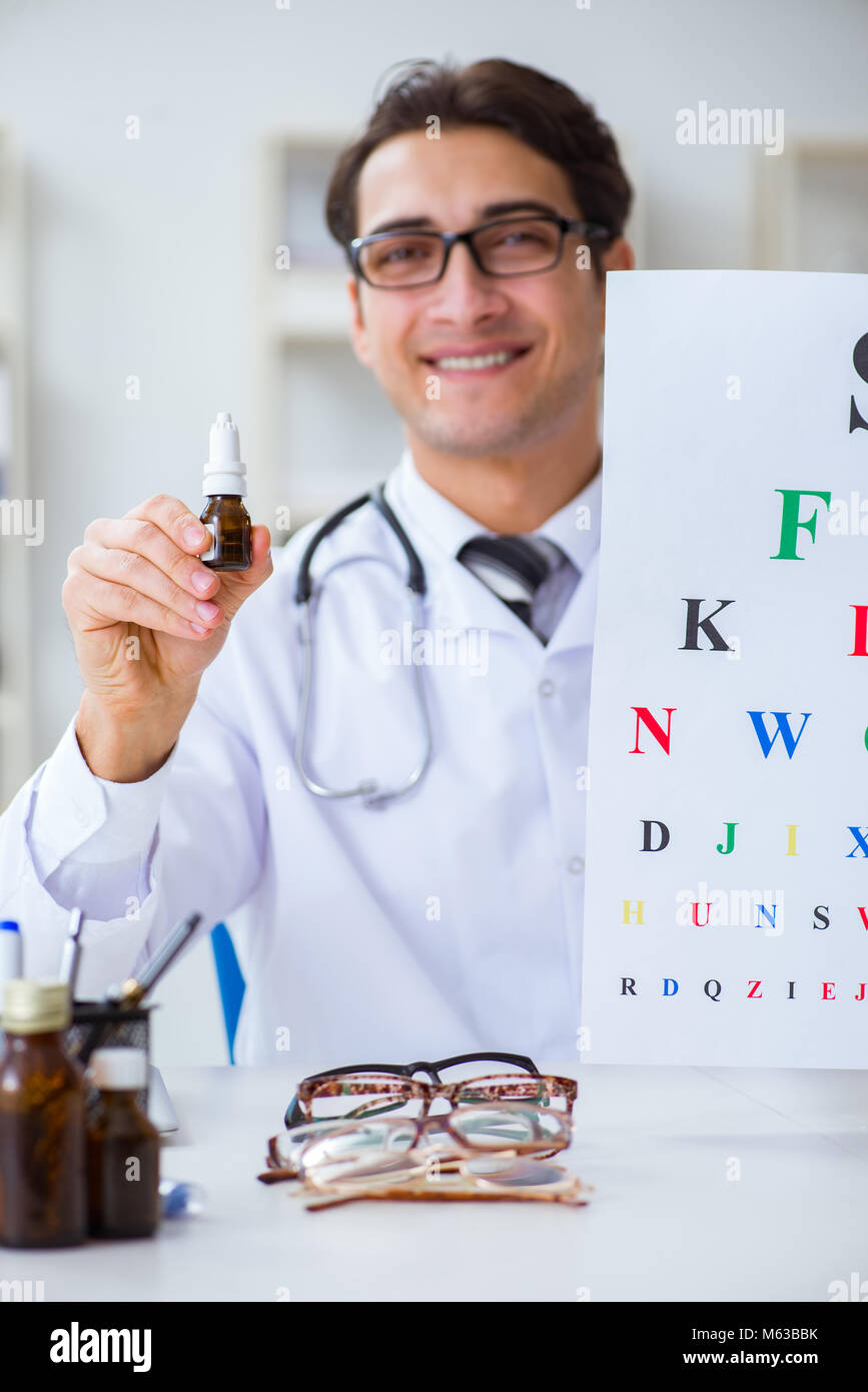 Eye doctor in medical concept Stock Photo - Alamy