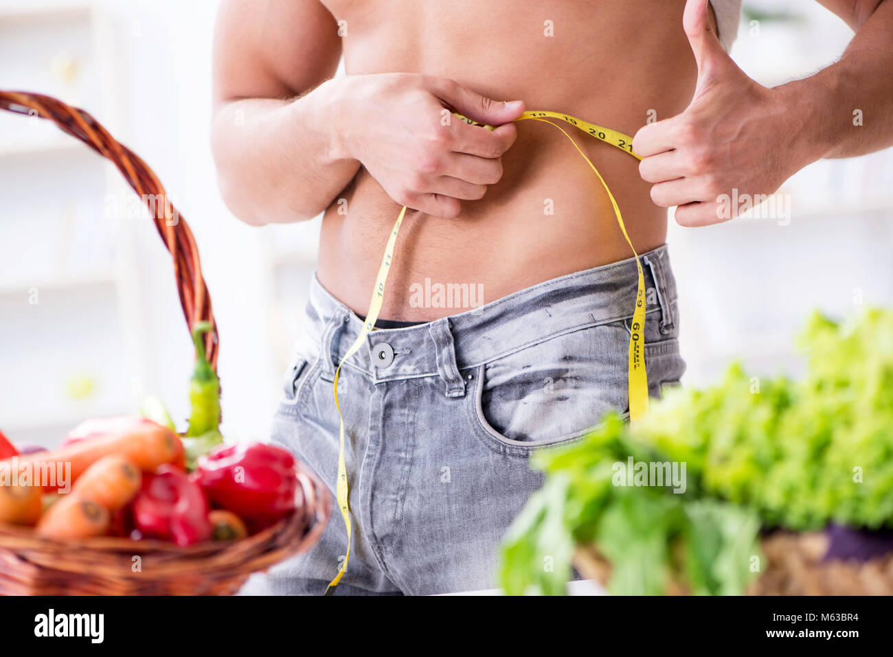 Young man in healthy eating and dieting concept Stock Photo - Alamy