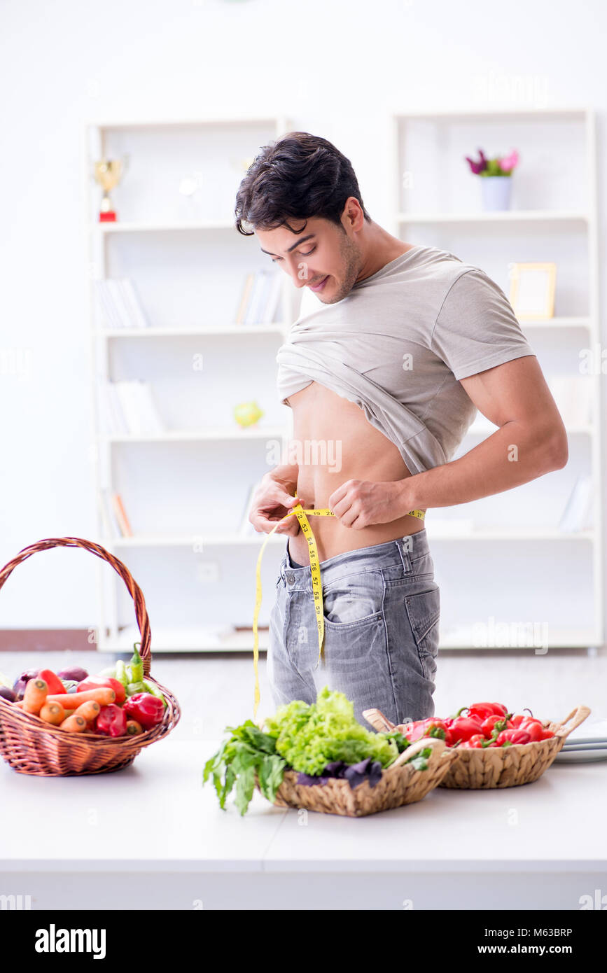 Young man in healthy eating and dieting concept Stock Photo - Alamy