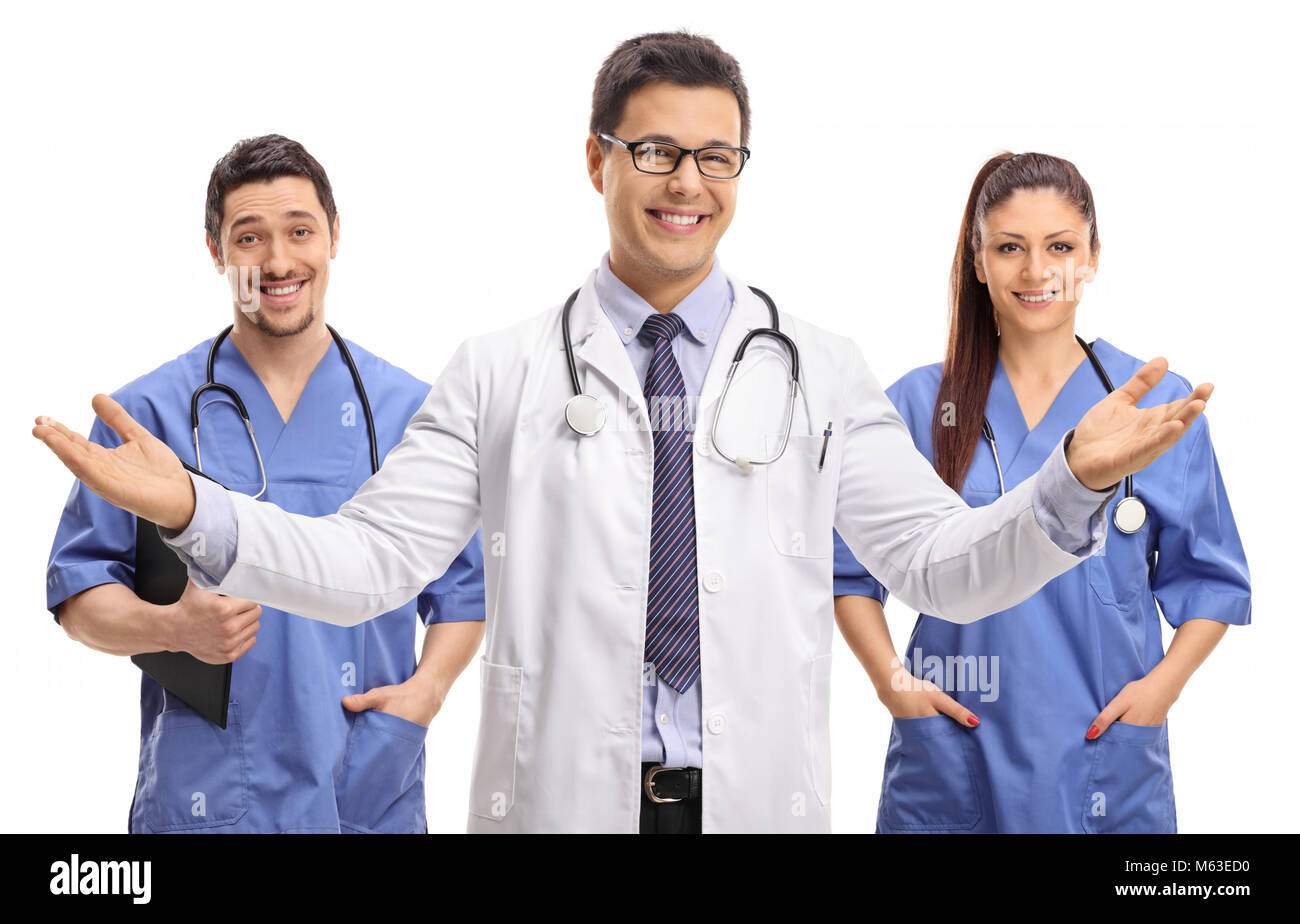Medical team of doctors looking at the camera and smiling isolated on ...