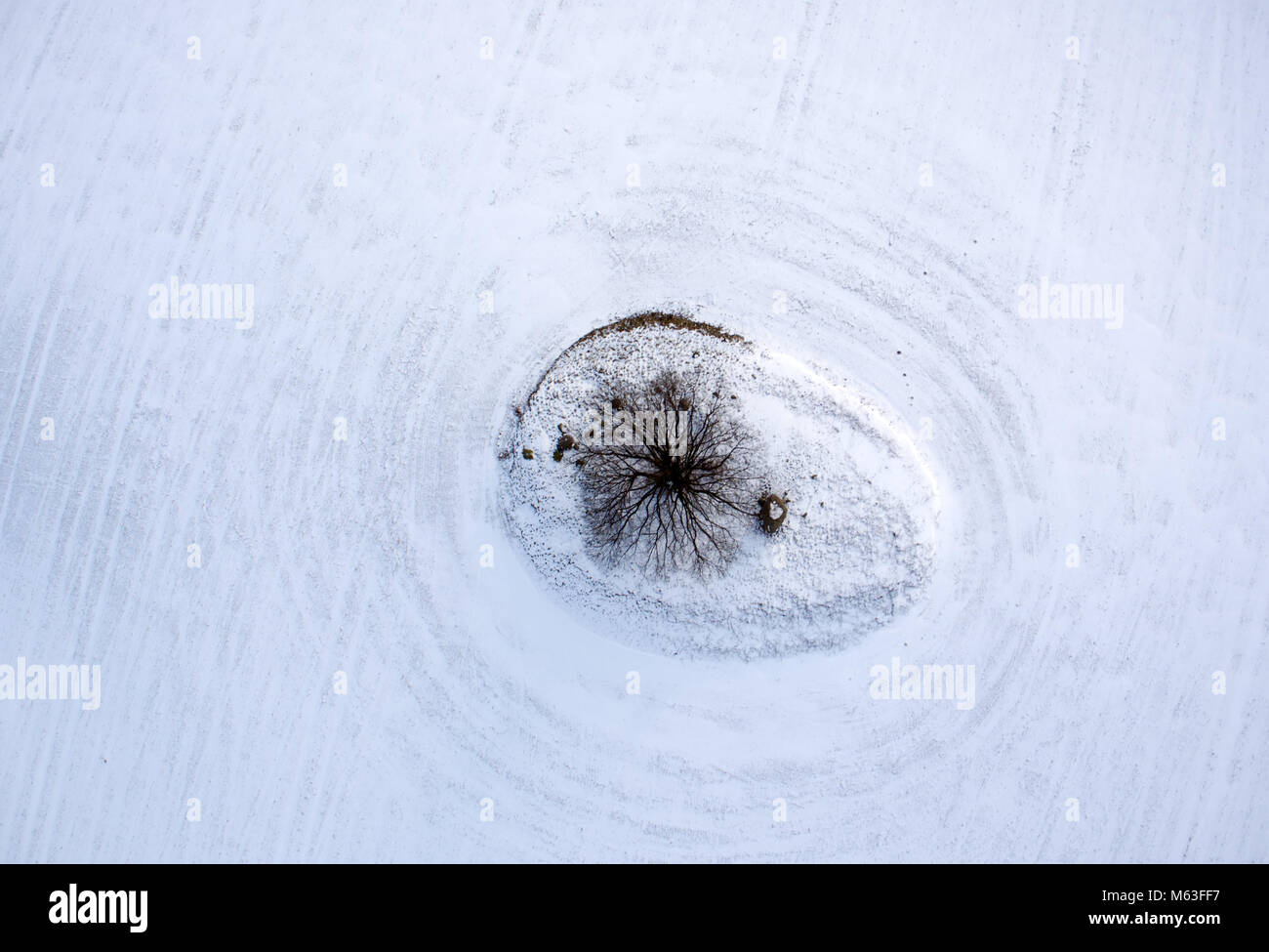 Snow covering an old burial mound in Gross Stieten, Germany, 27 ...