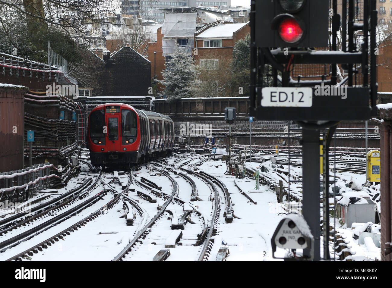 London, UK. 28th Feb, 2018. UK Weather: A red light for the tube trains ...