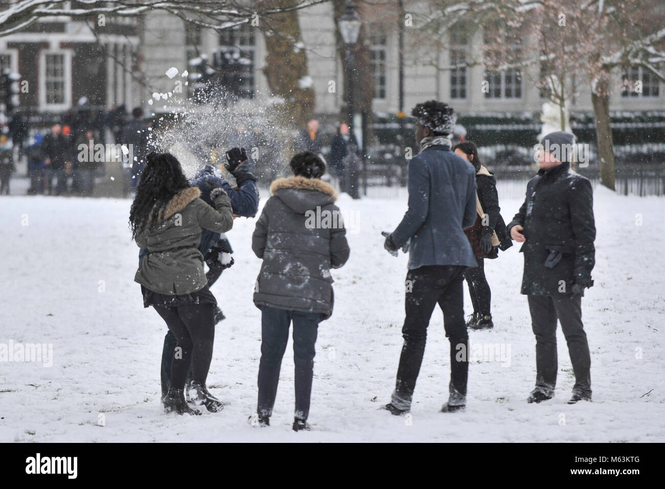 People have a snowball fight in london hi-res stock photography and ...