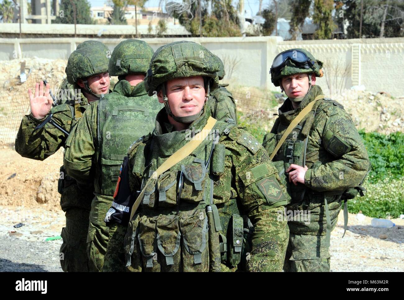 Damascus, Syria. 28th Feb, 2018. Russian military policemen guard a ...