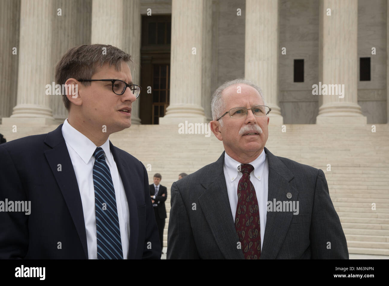 Washington DC, USA. 26th February, 2018. Mark Janus (right) stands in ...