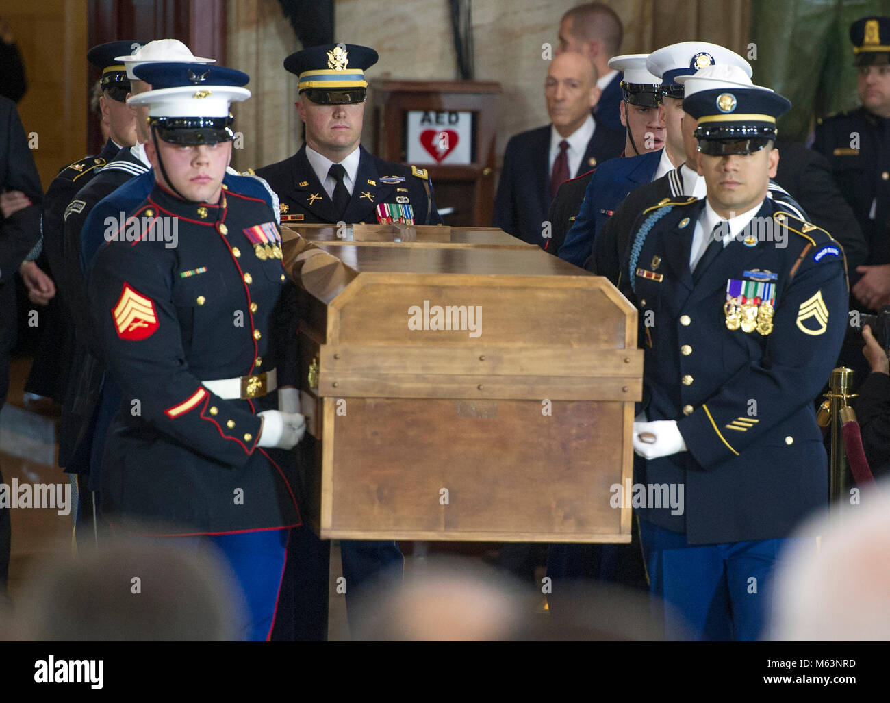 The casket carrying the remains of the Reverend Billy Graham are ...
