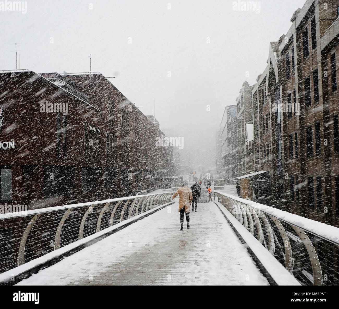 London, UK. 28th February, 2018. London's blizzard on Millennium bridge ...