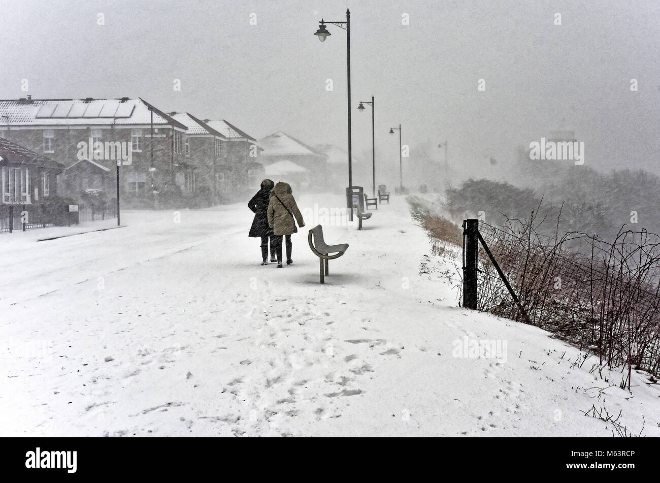 Girls walking snow blizzard uk hi-res stock photography and images - Alamy