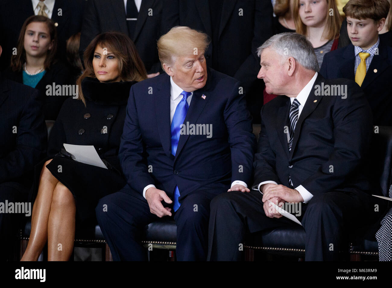 US President Donald J. Trump (C), with First Lady Melania Trump (L ...