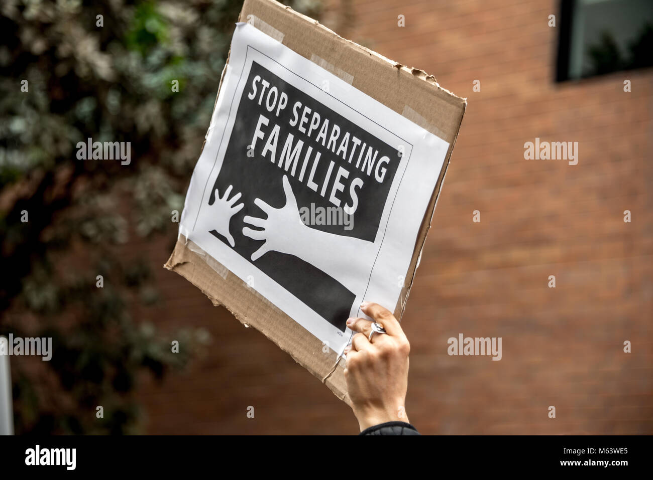 Stop separating families hi-res stock photography and images - Alamy
