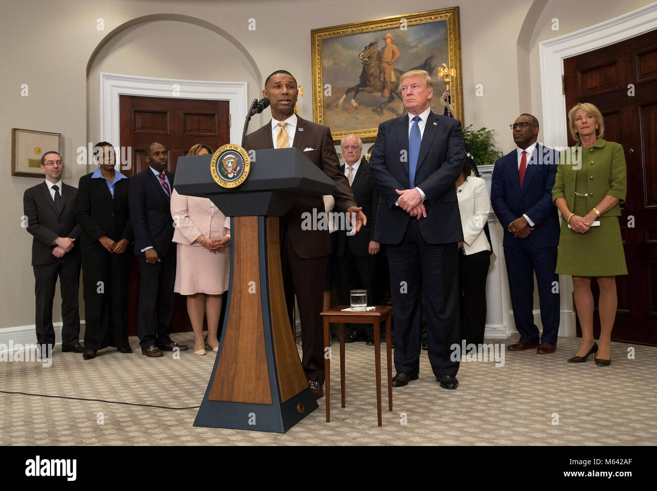 Johnny Taylor, Jr. speaks after being introduced by President Donald ...