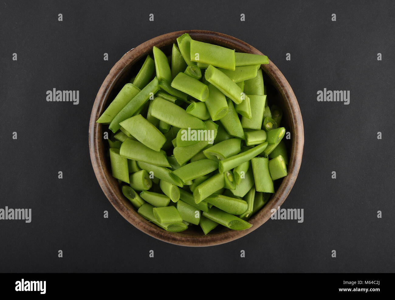 Common beans cut in bowl Stock Photo - Alamy