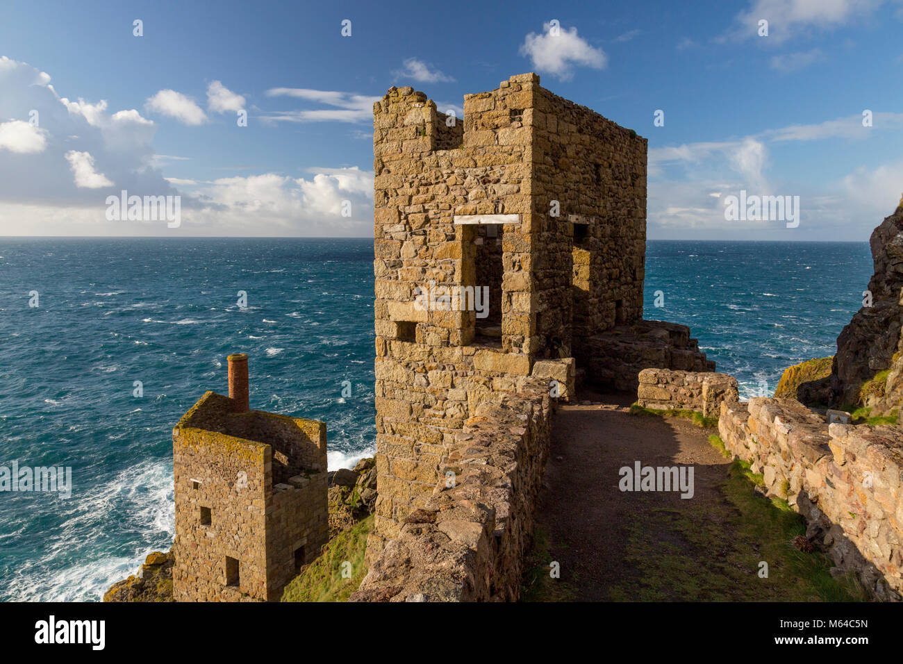 The ruins of the engine house of the Crowns tin mine at Botallack is ...