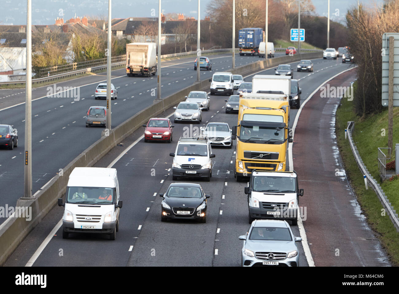 vehicles driving along the M2 motorway outside Belfast at rush hour ...