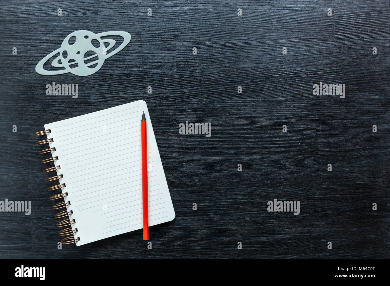 Zodiacal star, constellations on a black background with a notepad and ...