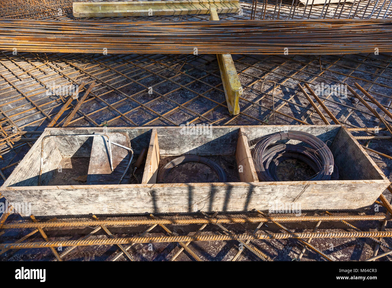 Construction workers fabricating steel reinforcement bar at the ...