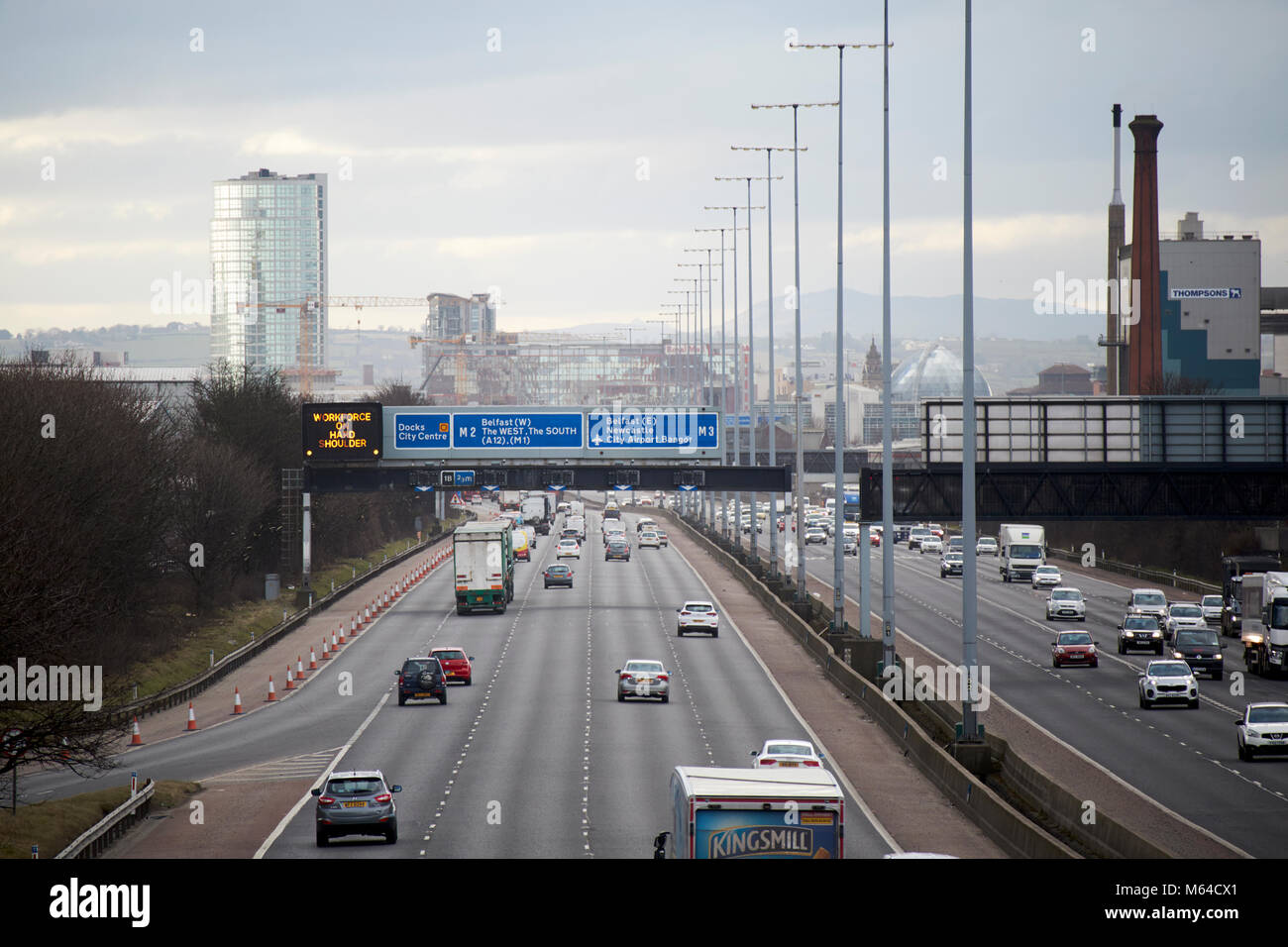 cars driving along the M2 motorway towards Belfast city centre northern ...