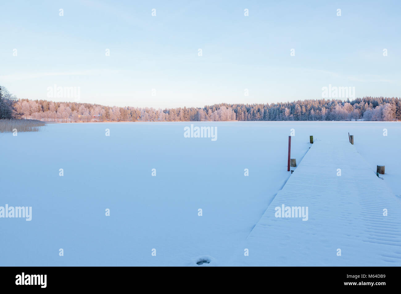 Winter lake scenery in finland Stock Photo - Alamy