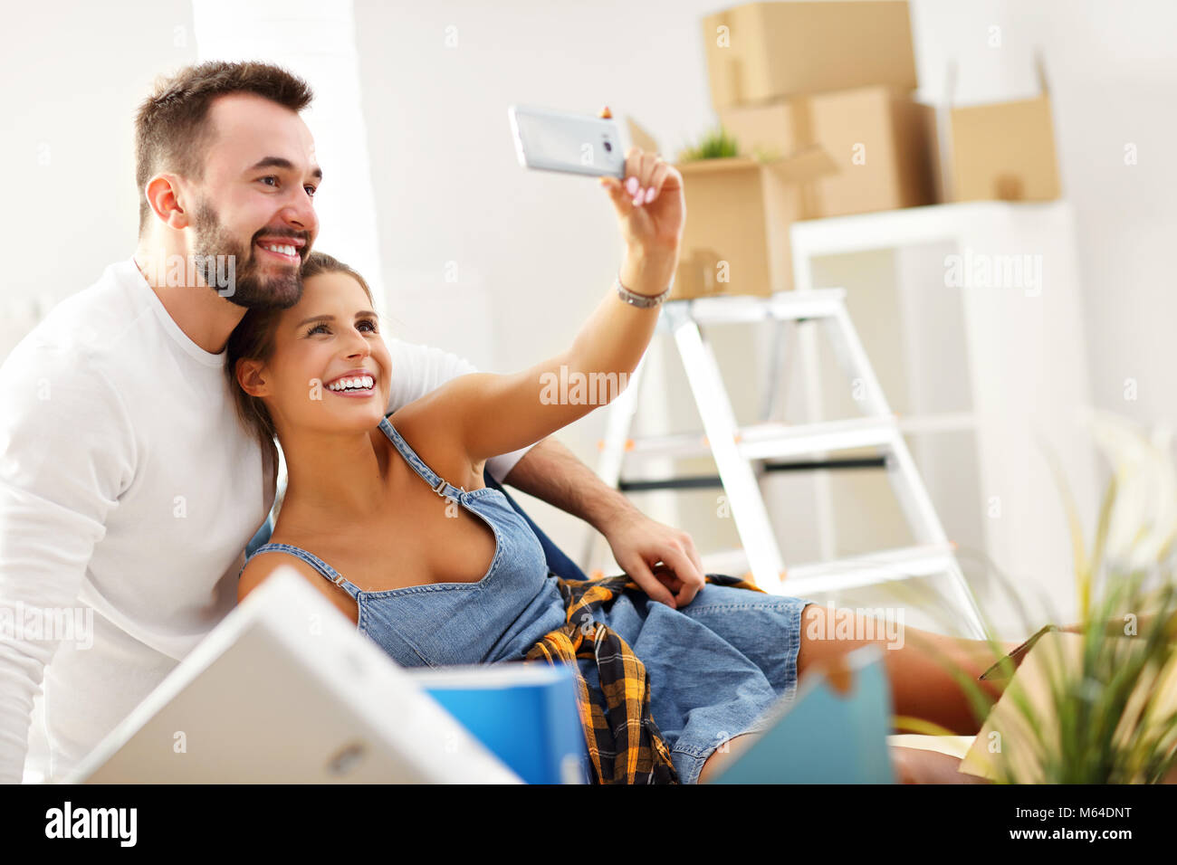 Happy Adult Couple Moving Out Or In To New Home Stock Photo Alamy happy-adult-couple-moving-out-or-in-to-new-home-stock-photo-alamy