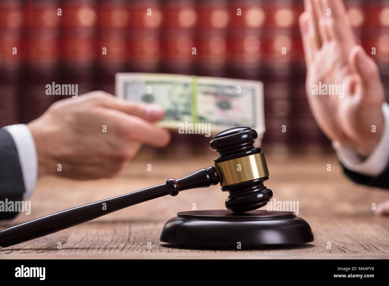 Close-up Of A Gavel In Front Of Judge Refusing To Take Bribe From ...