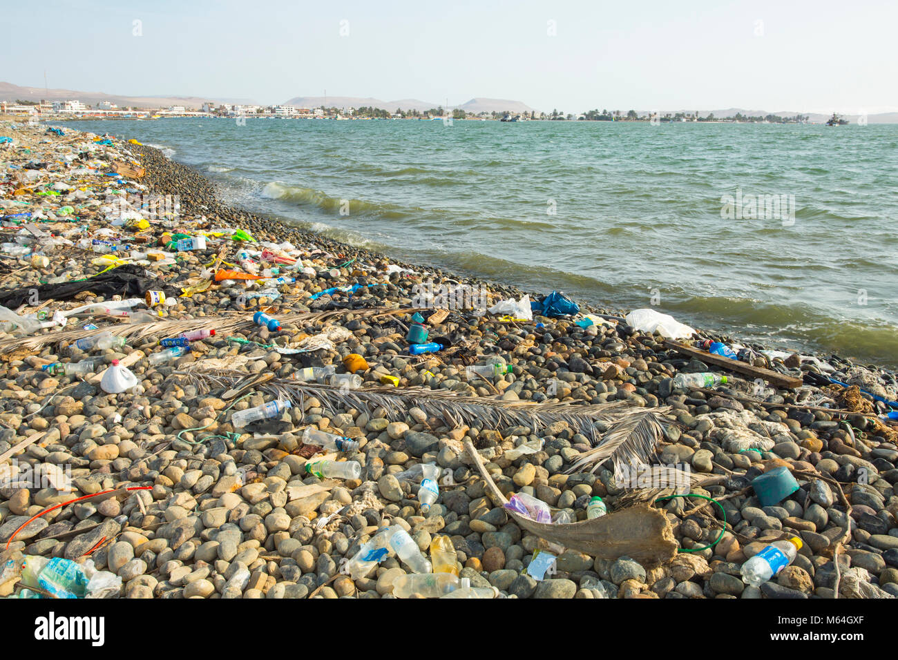 Polluted beach. Environmental contamination wit plastics in the coast ...