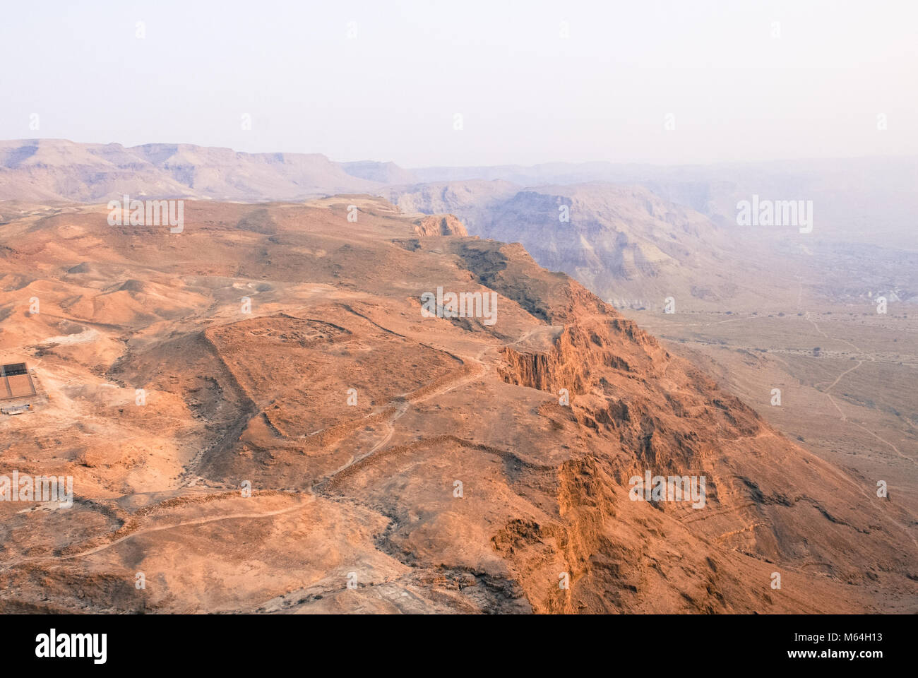 Wide angle picture of mountainous relief during sunrise in Massada ...