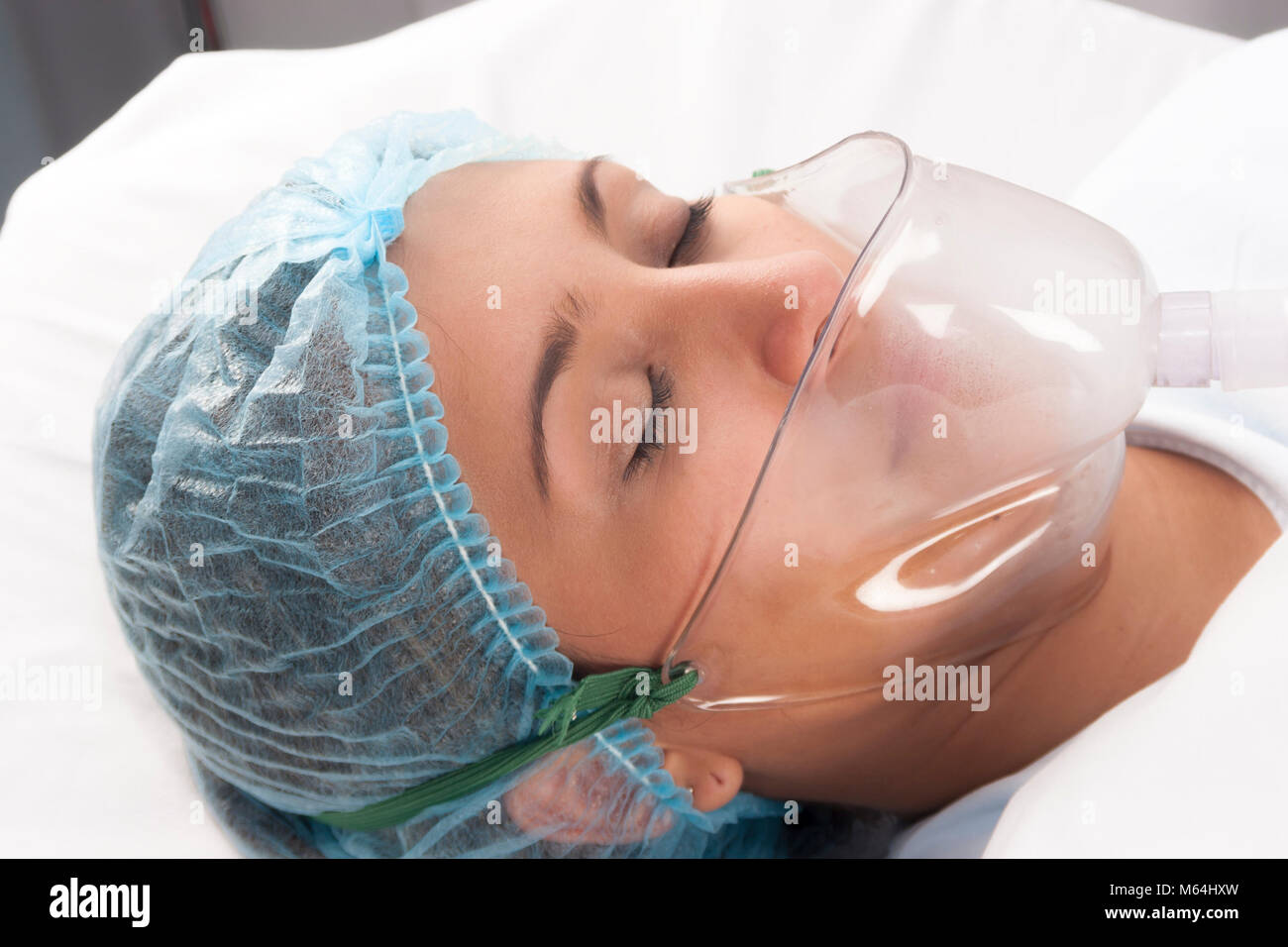 Beautiful patient receives anaesthetic in hospital Stock Photo - Alamy