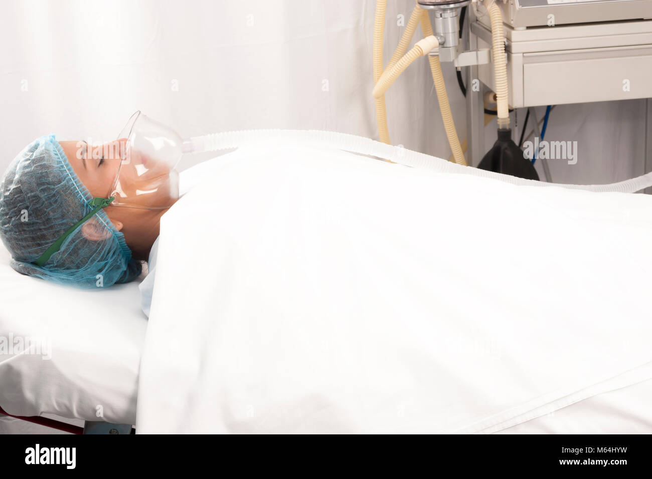 Beautiful patient receives anaesthetic in hospital Stock Photo - Alamy