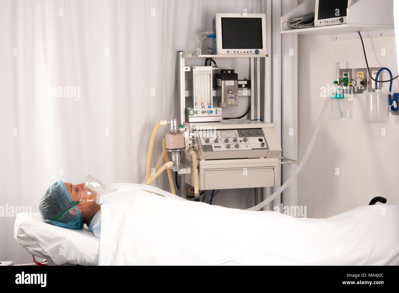 Beautiful patient receives anaesthetic in hospital Stock Photo - Alamy