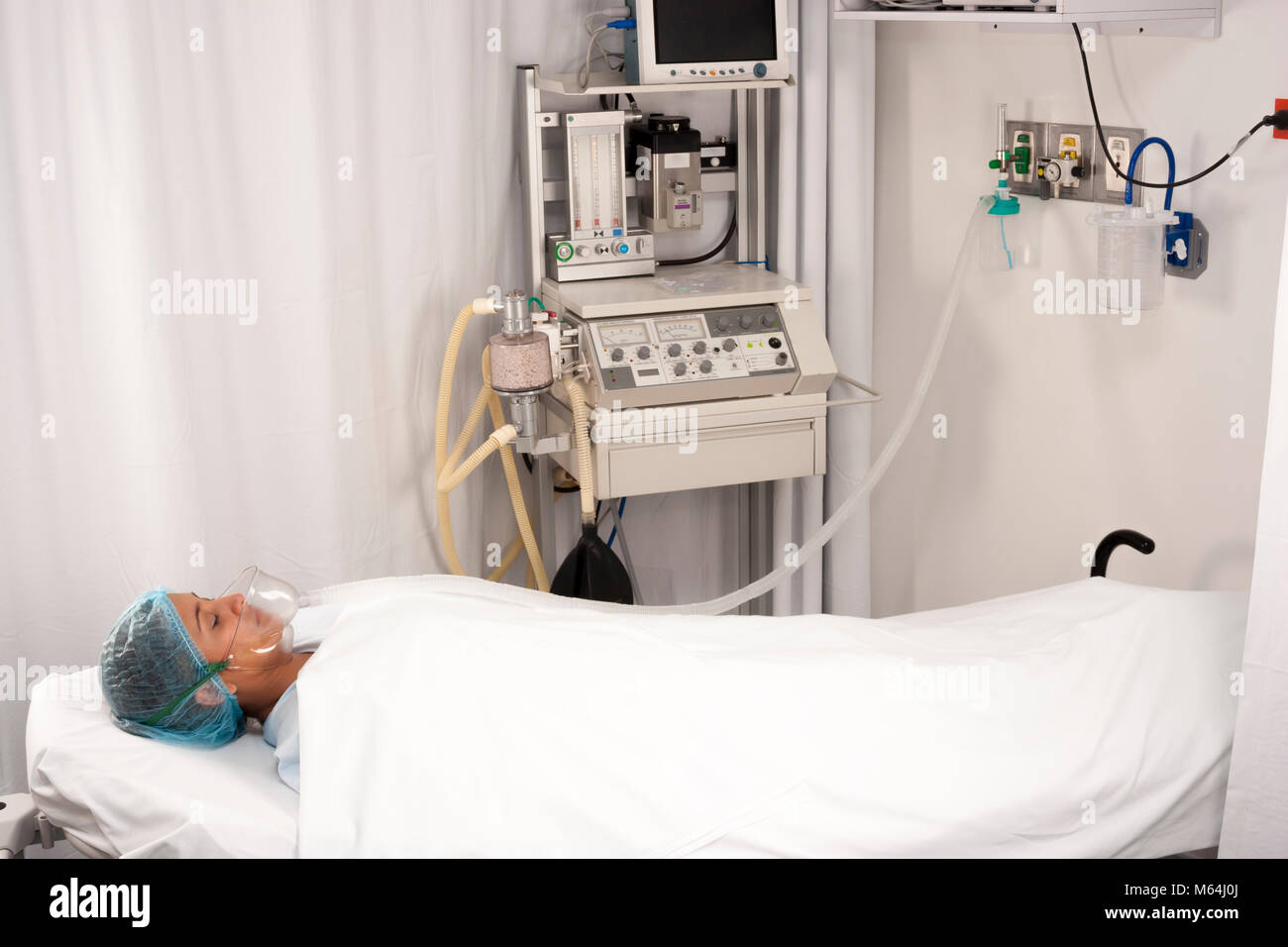 Beautiful patient receives anaesthetic in hospital Stock Photo - Alamy