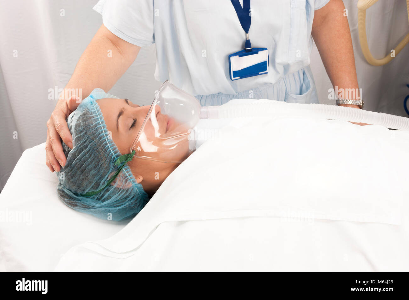 Beautiful patient receives anaesthetic in hospital Stock Photo - Alamy