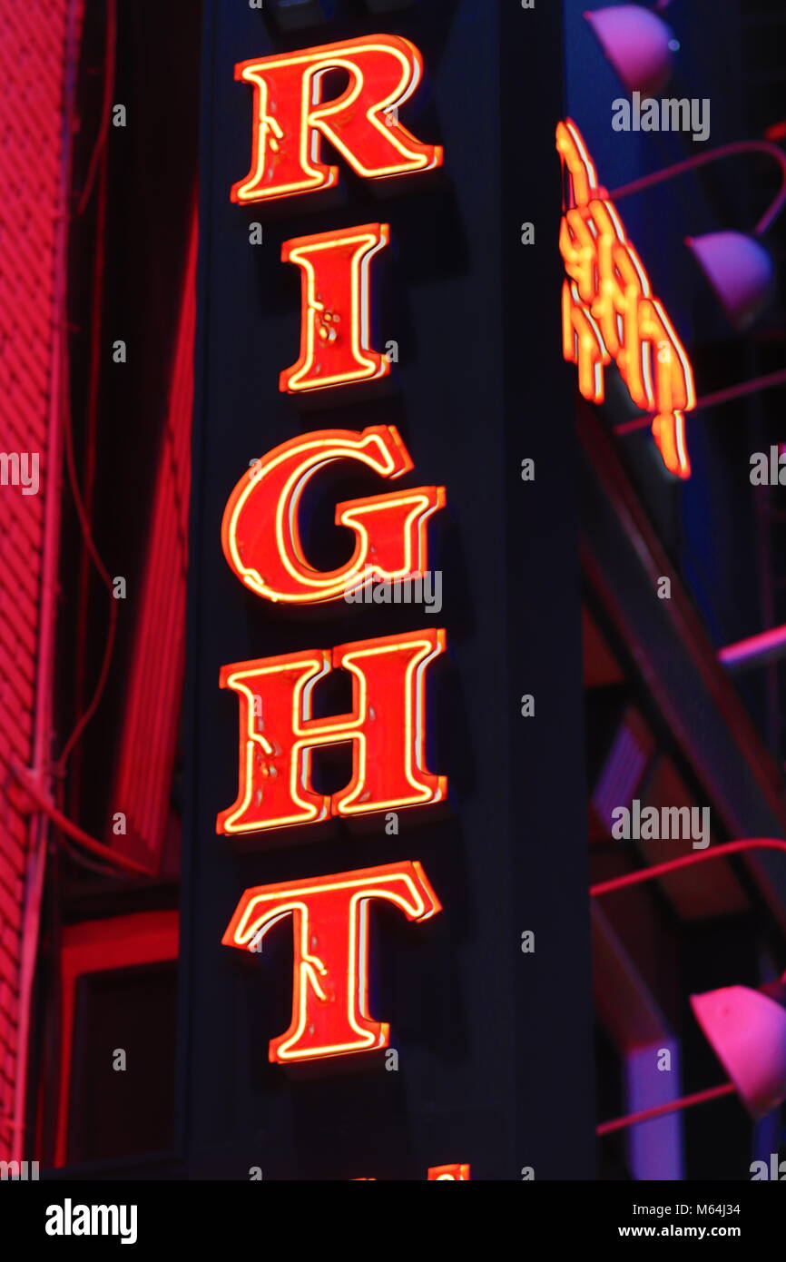 Neon sign on Times Square Stock Photo - Alamy