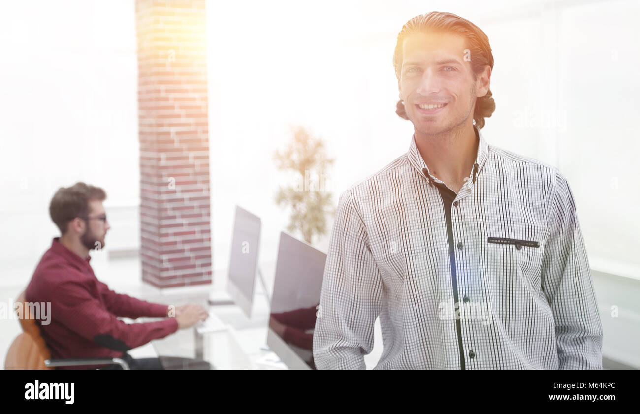 successful employee ,standing in the office Stock Photo - Alamy
