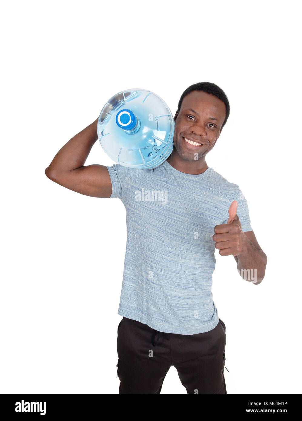 Man carrying water jug hi-res stock photography and images - Alamy