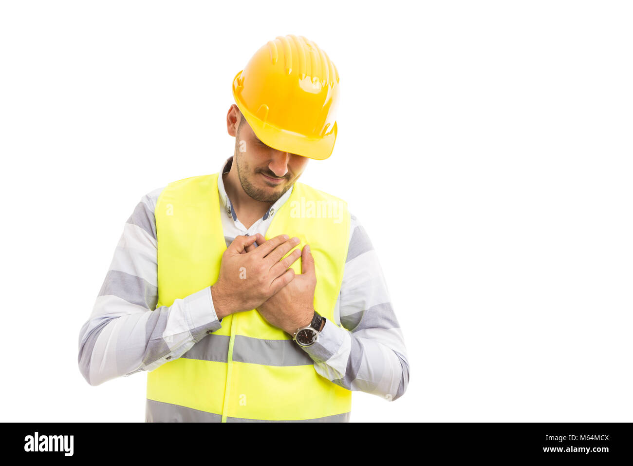 Construction worker engineer or builder suffering heart pain as infarct ...