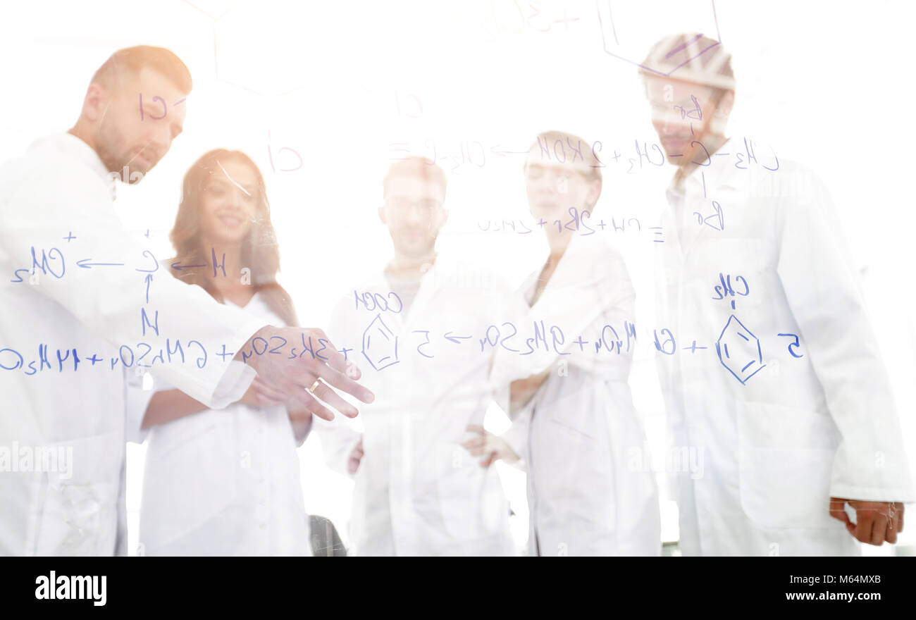 in the background image group laboratory scientists discussing their ...