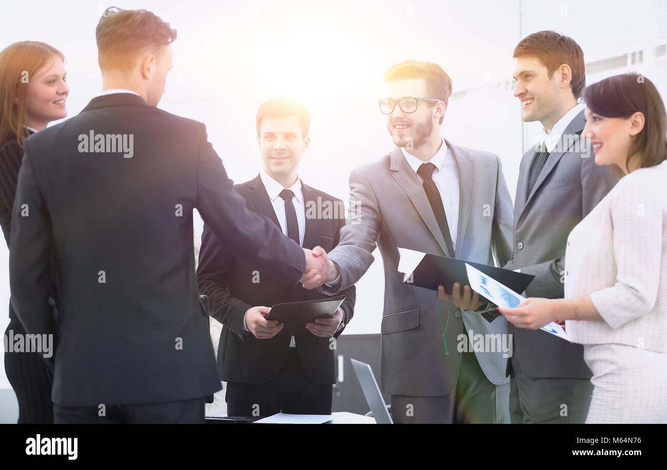 handshake of business partners before the financial transaction Stock ...