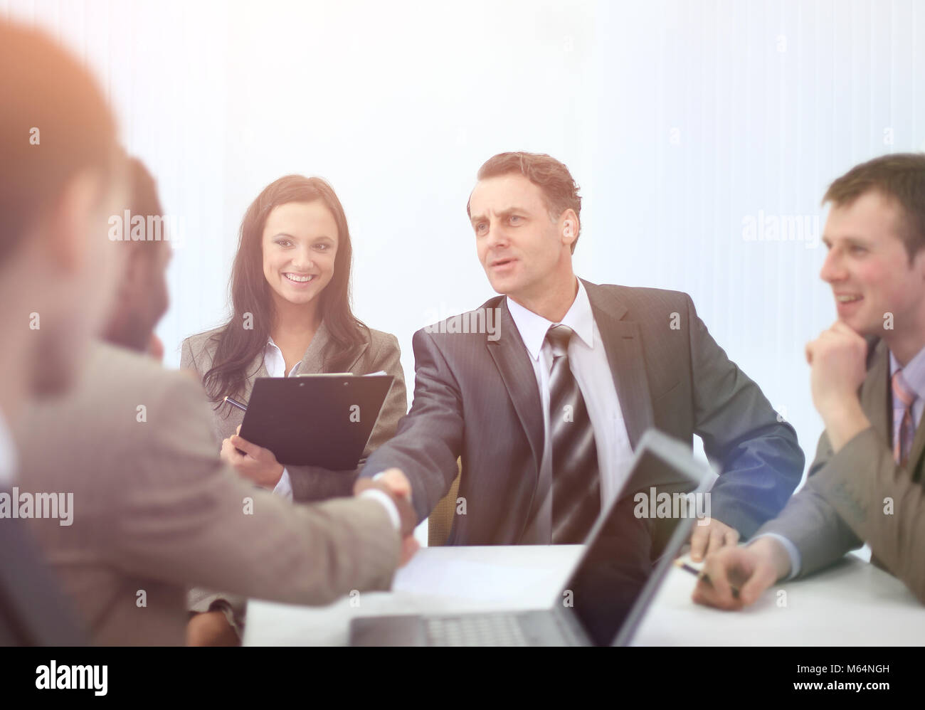 welcome and handshake business partners Stock Photo - Alamy