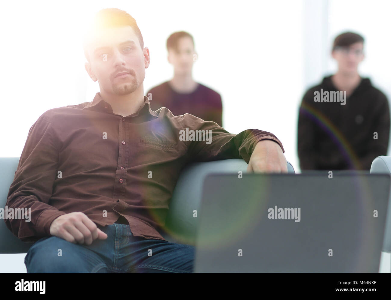 closeup.brooding guy with a laptop Stock Photo - Alamy