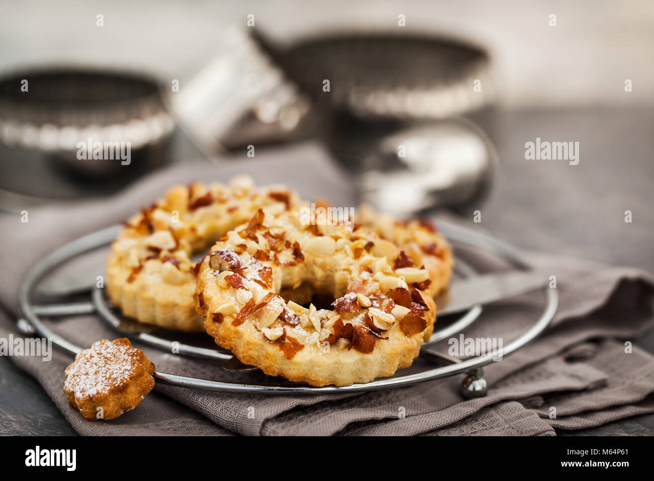 Ring shortbread cookies with peanuts on top Stock Photo - Alamy