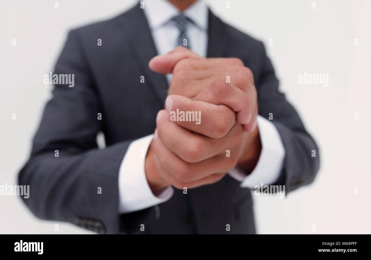 Close up on male clenched hands Stock Photo - Alamy